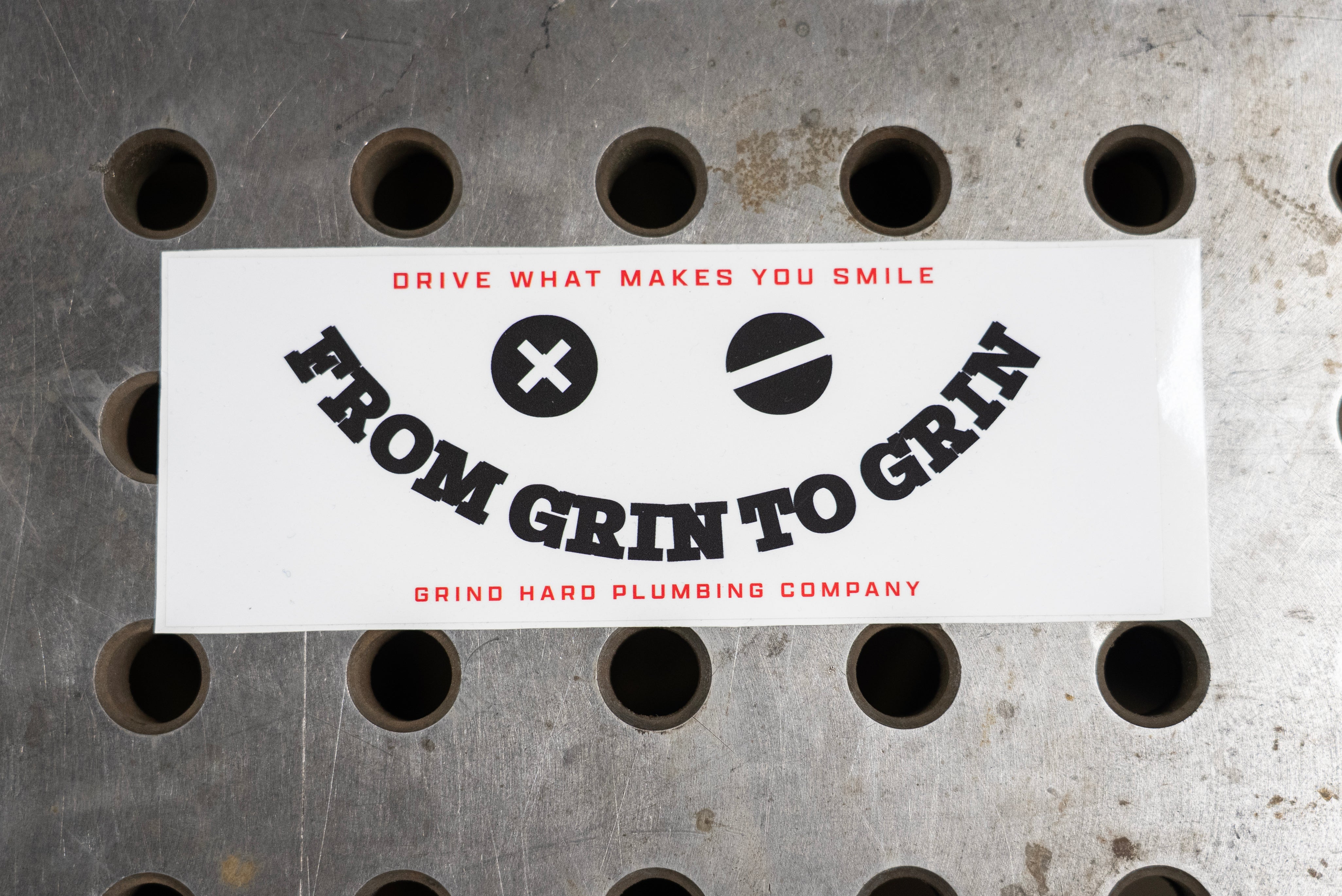Grin to Grin Bumper Sticker – Grind Hard Plumbing Co
