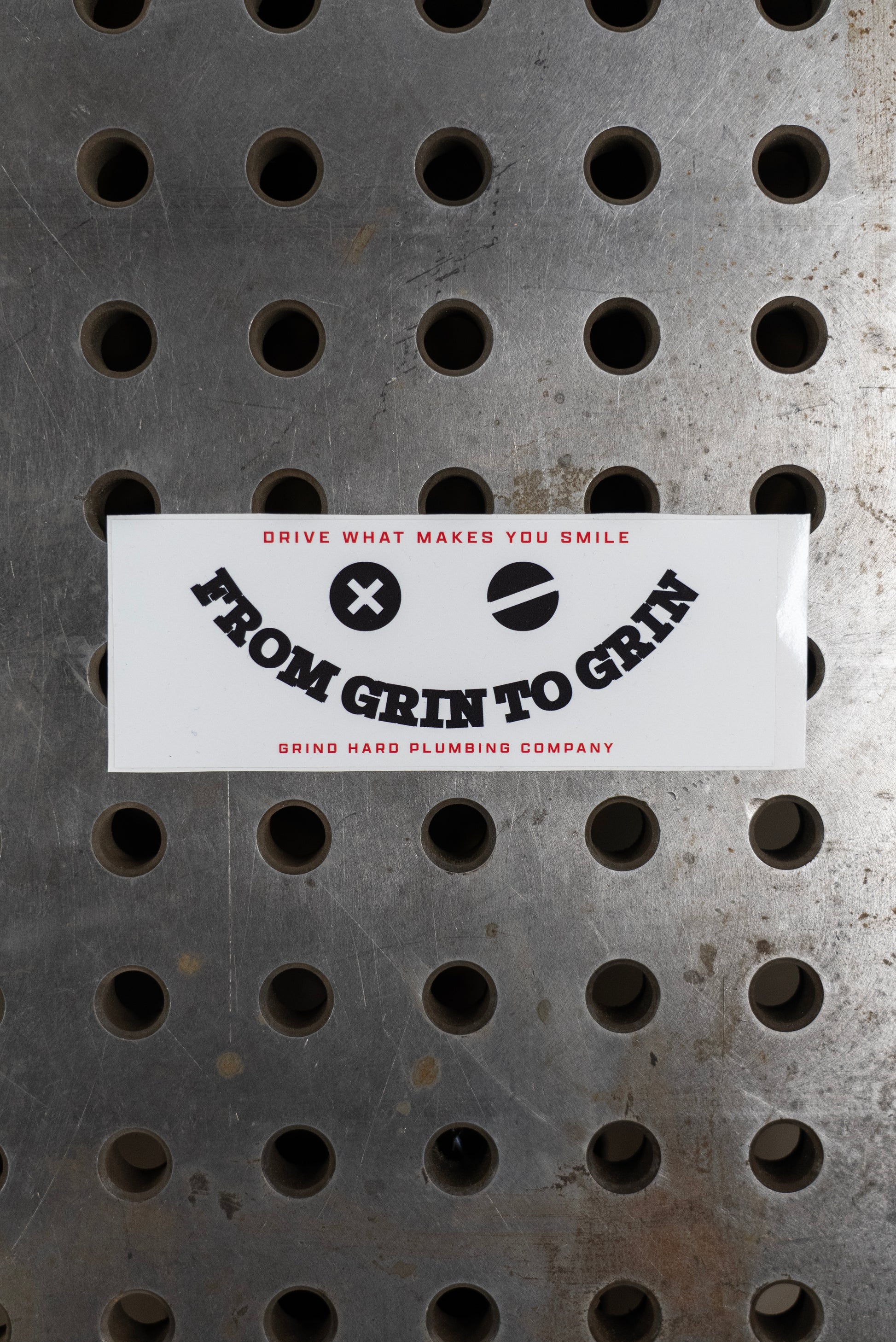 Grin to Grin Bumper Sticker – Grind Hard Plumbing Co